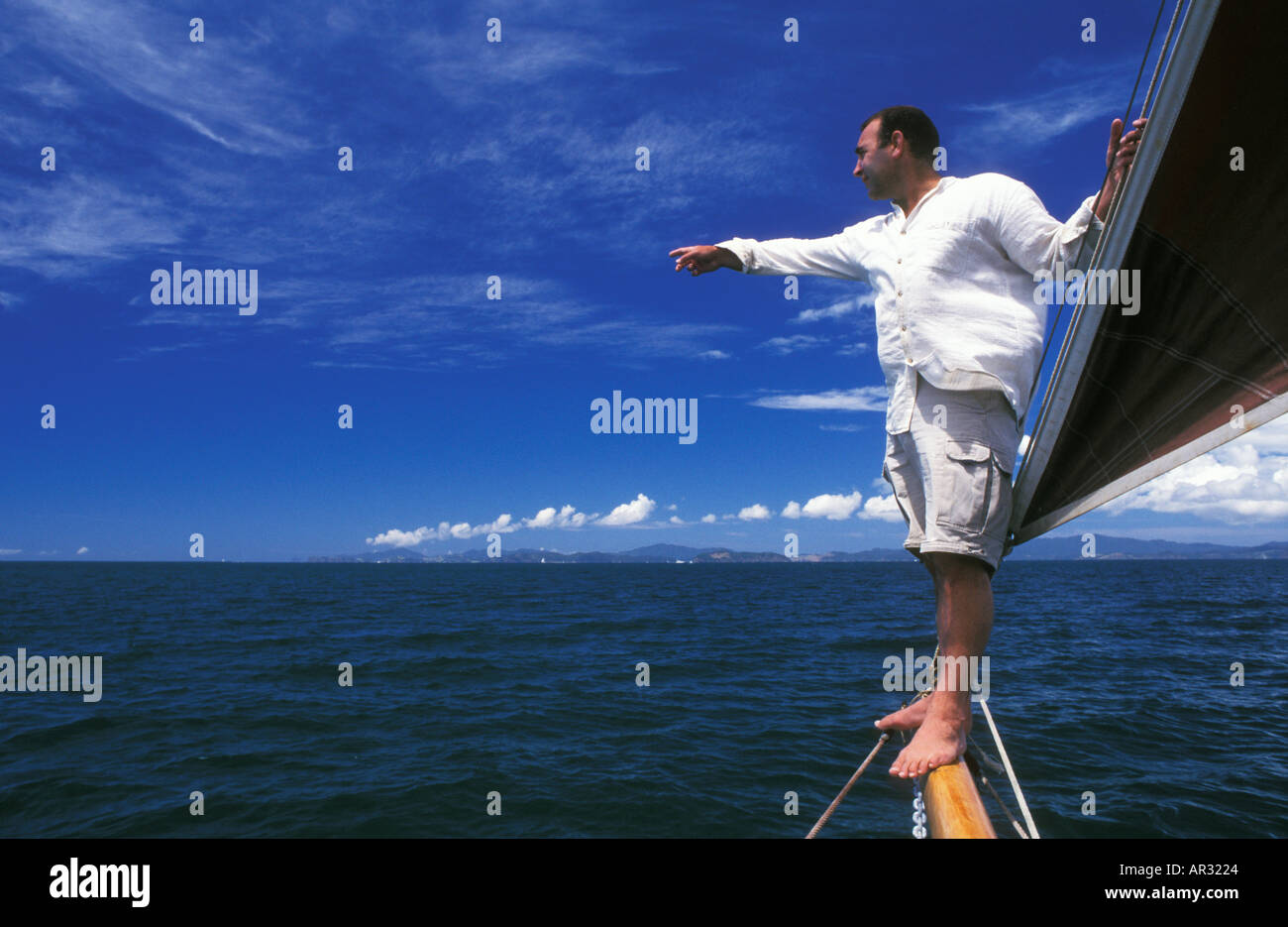 classic sailing boat sailor pointing bay of islands new zealand Stock ...