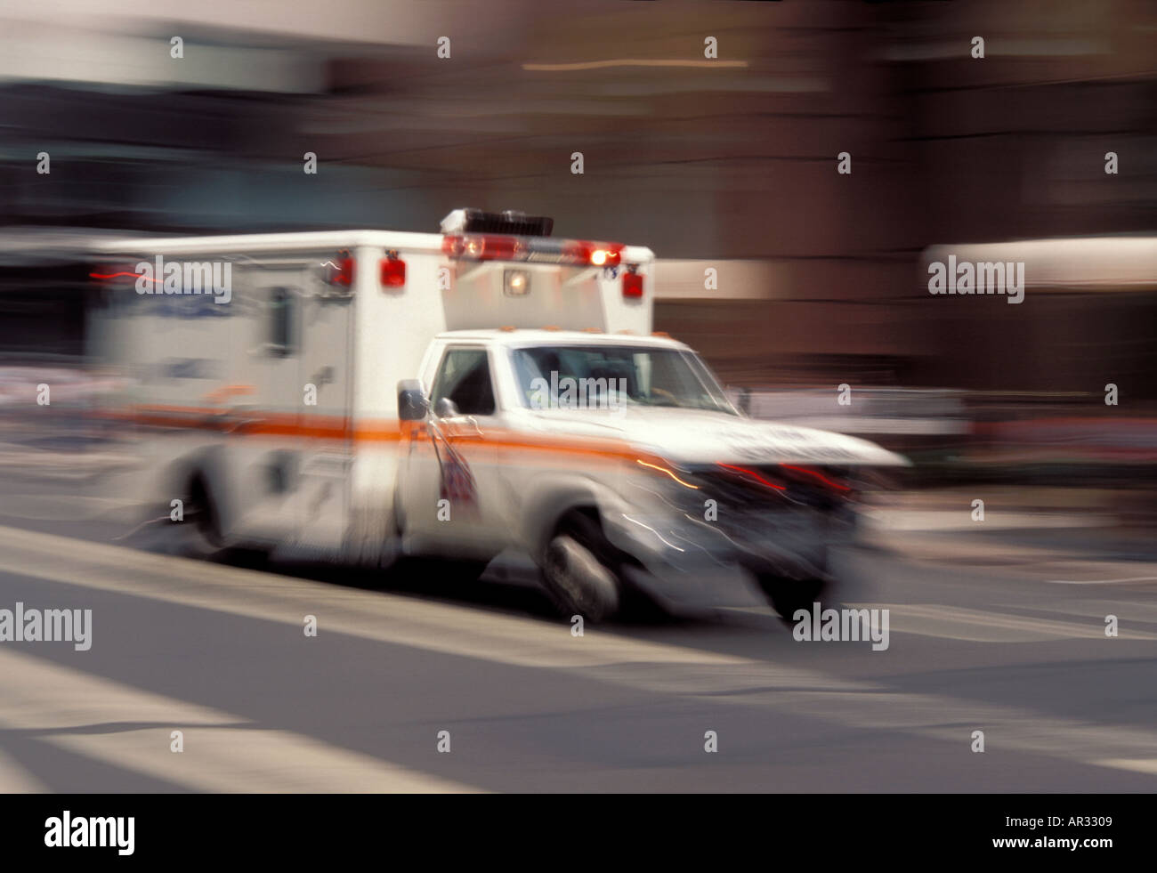 Ambulance on emergency Stock Photo - Alamy