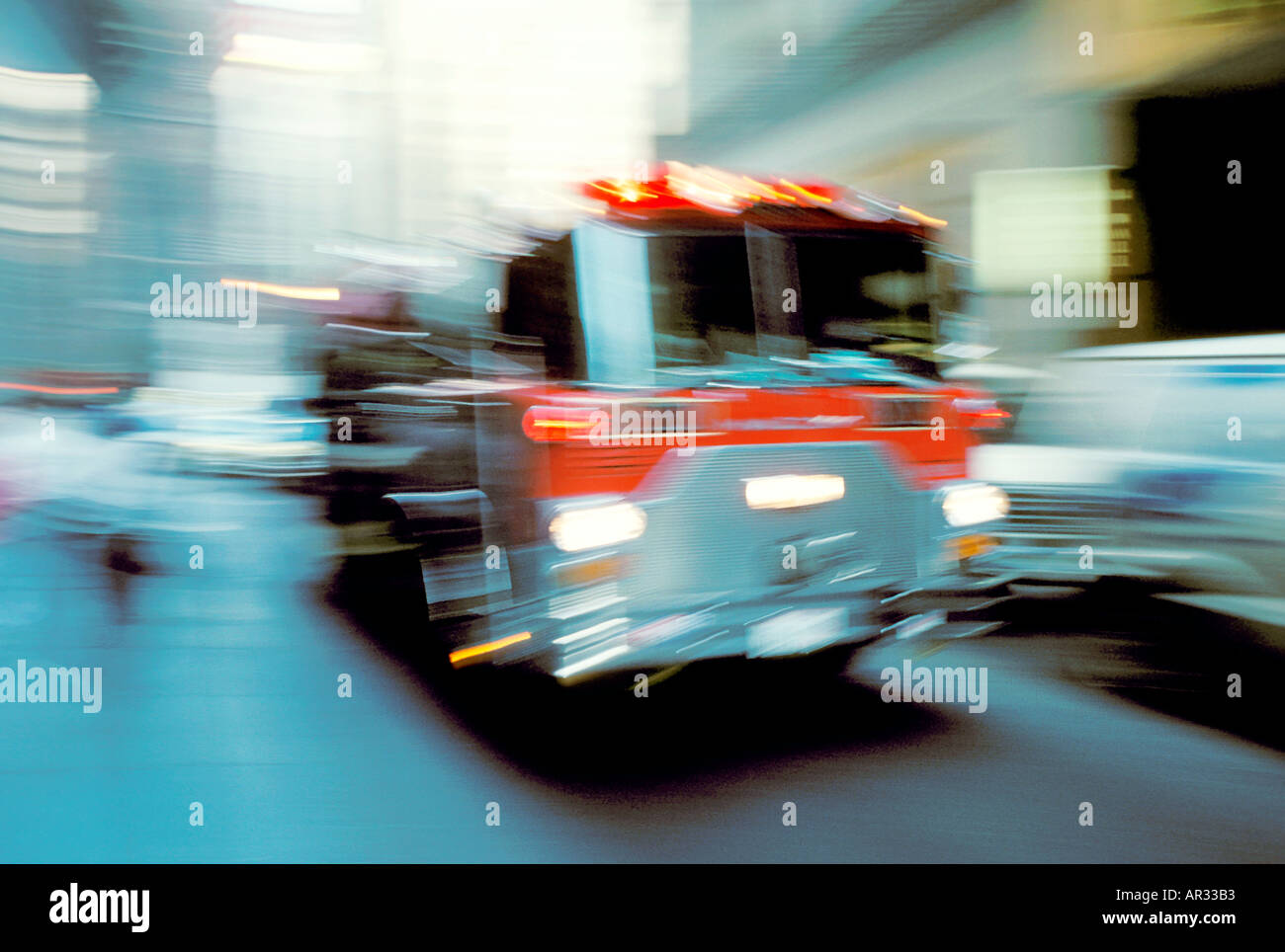 Fire truck in movement Stock Photo - Alamy