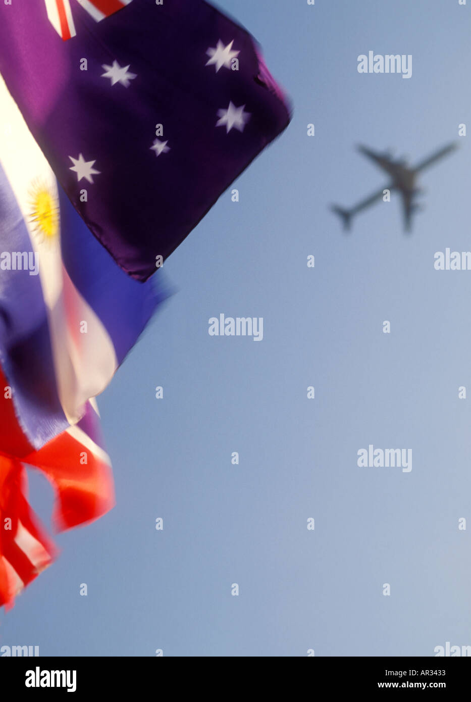 Plain International flags with plane Stock Photo - Alamy