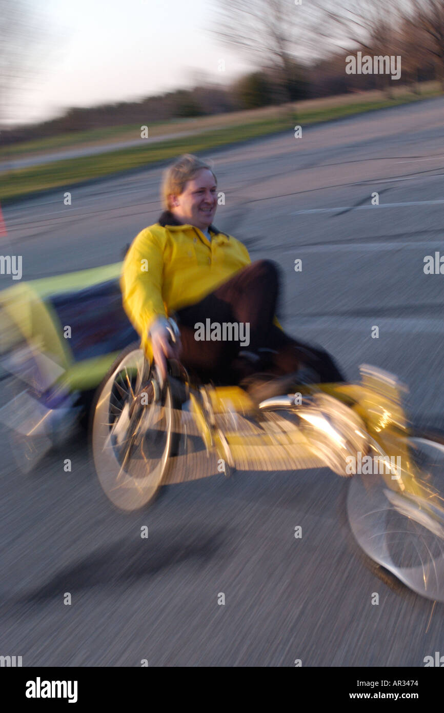 man riding recumbent bike towing a trailer Stock Photo - Alamy