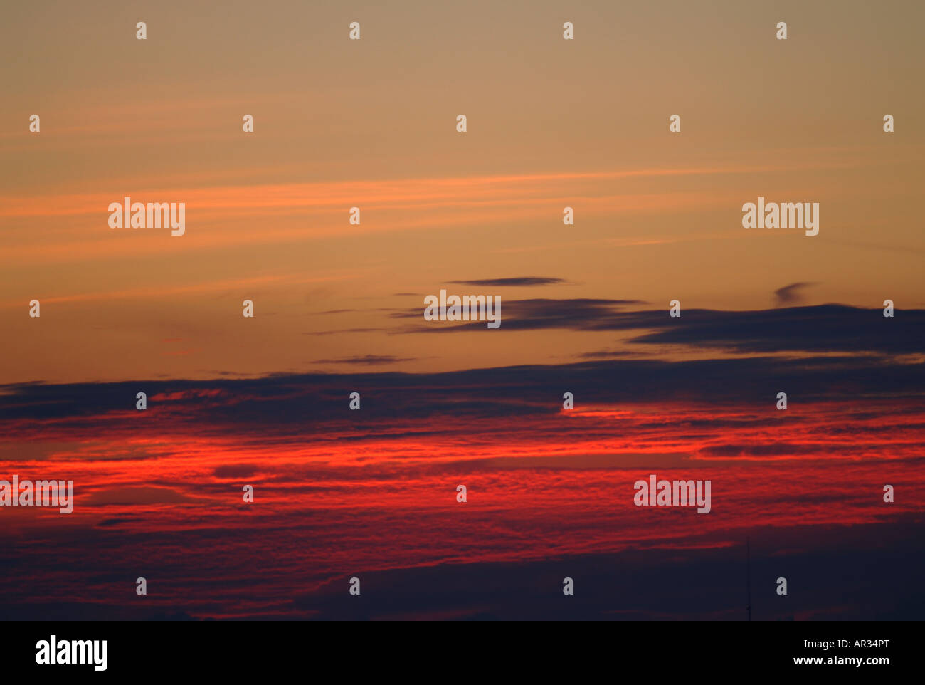 Bright red sky with clouds Stock Photo - Alamy