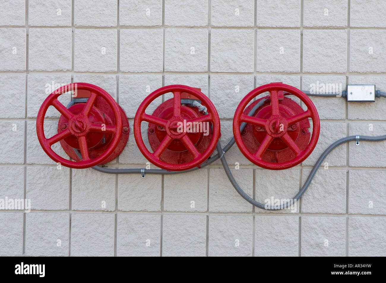 Three Red Valves Stock Photo - Alamy