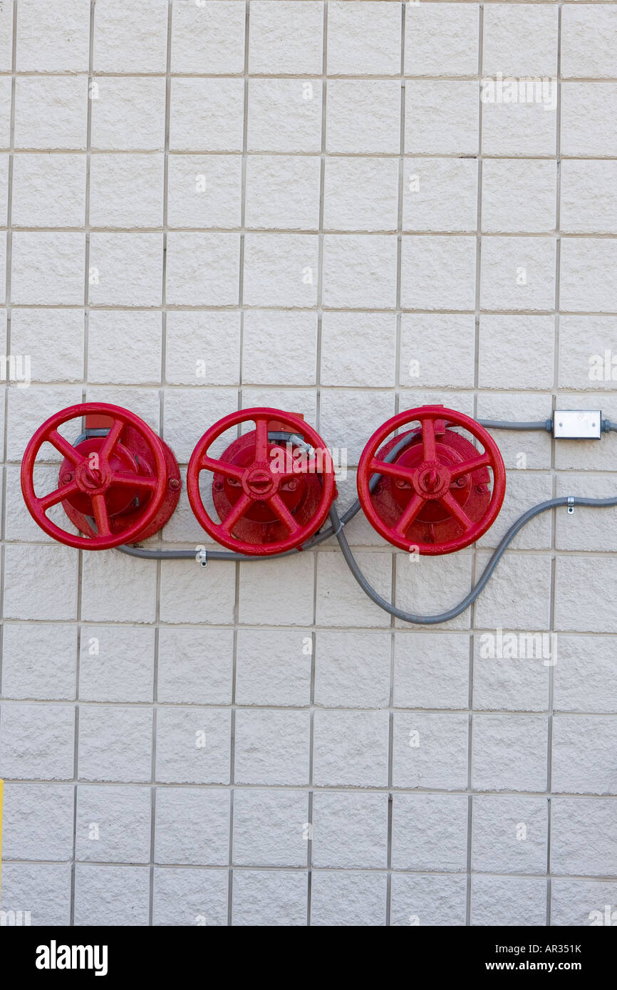 Three Red Valves Stock Photo - Alamy
