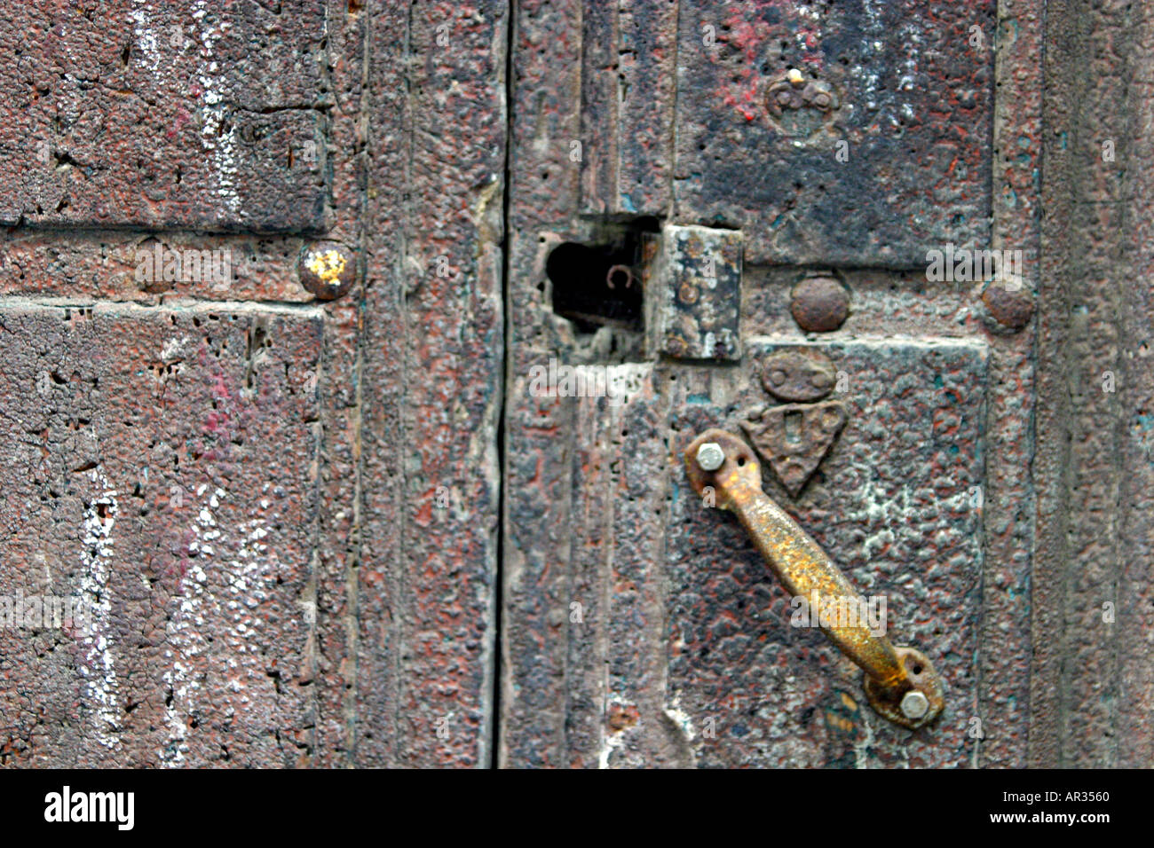 Old metal door with missing lock Stock Photo - Alamy
