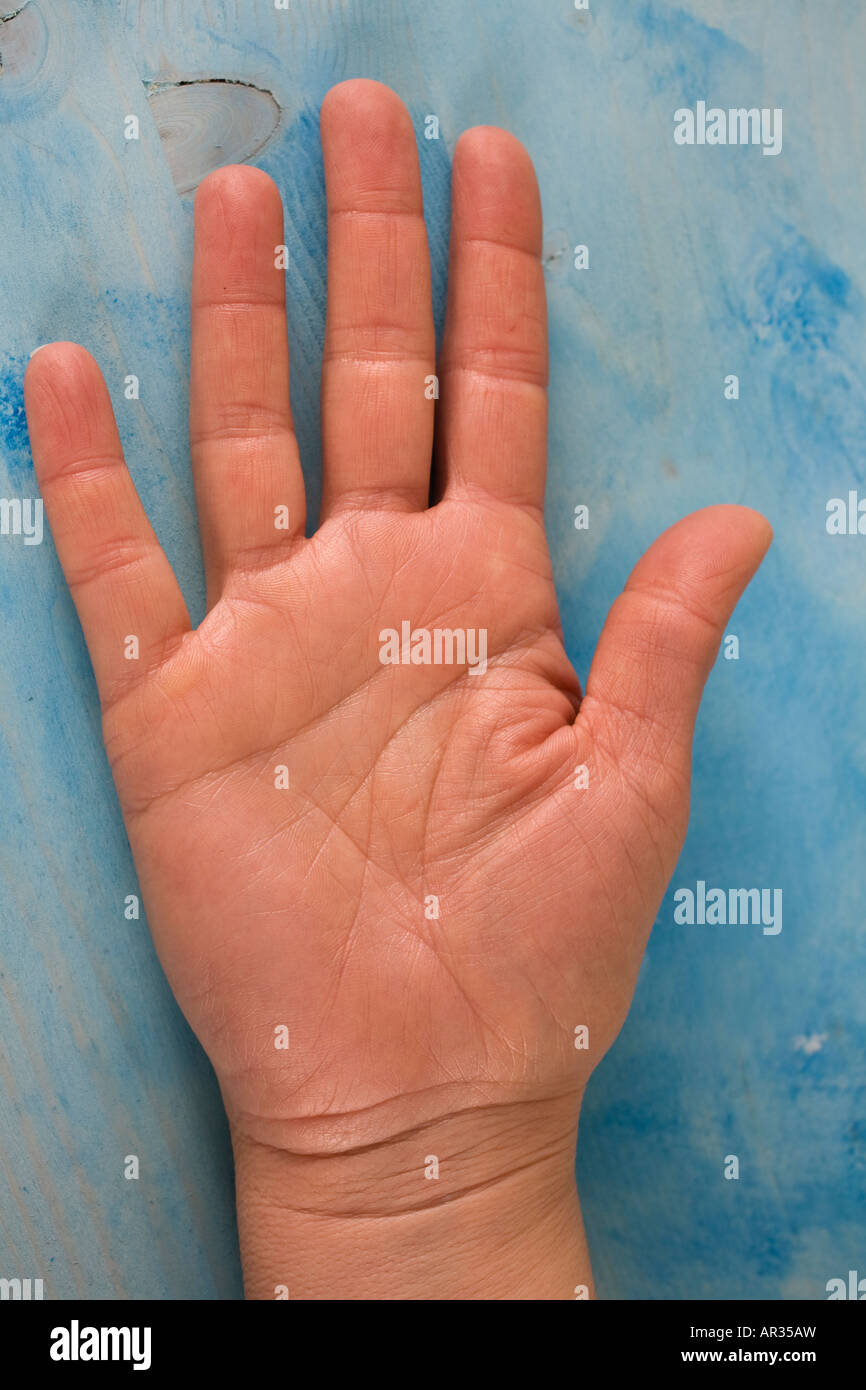 Mature female hand with open palm surface Stock Photo - Alamy