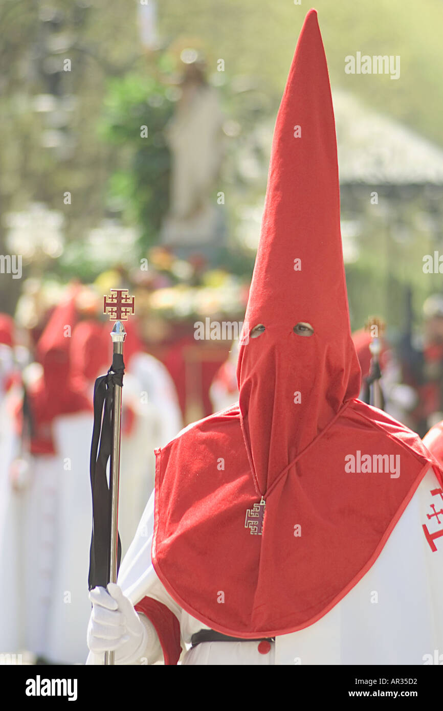 Penitent with red hood in Easter procession in Northern Spain Stock ...