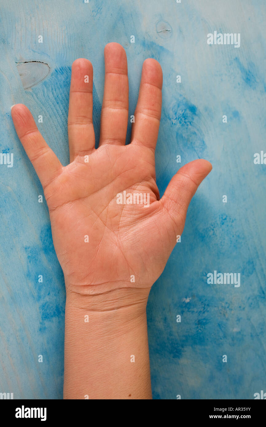 Mature female hand with open palm surface Stock Photo - Alamy