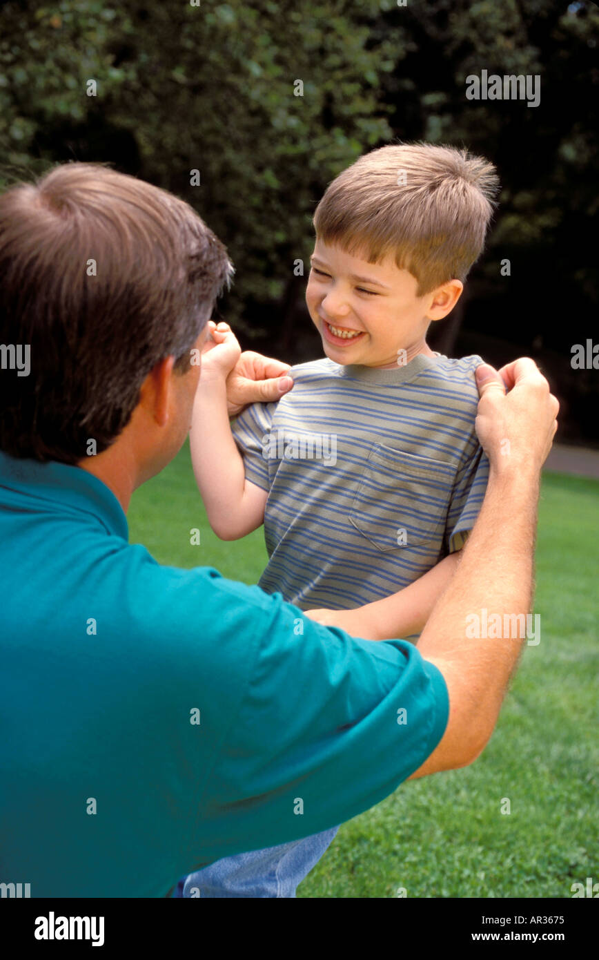 Family Father jokes with son Stock Photo - Alamy