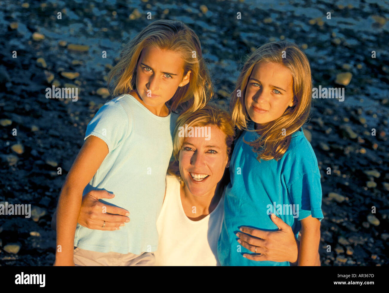Family Mother and 2 daughters Stock Photo - Alamy