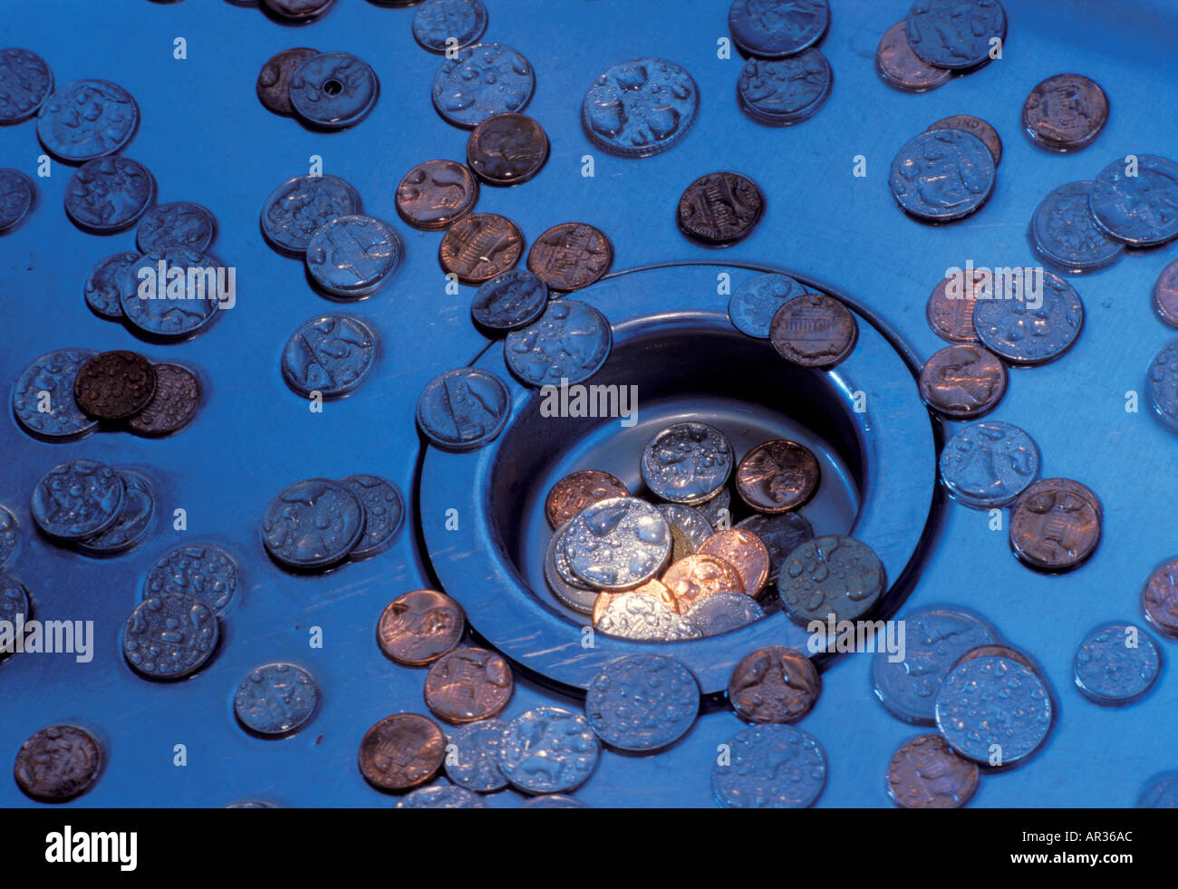 Money Change in drain Stock Photo - Alamy