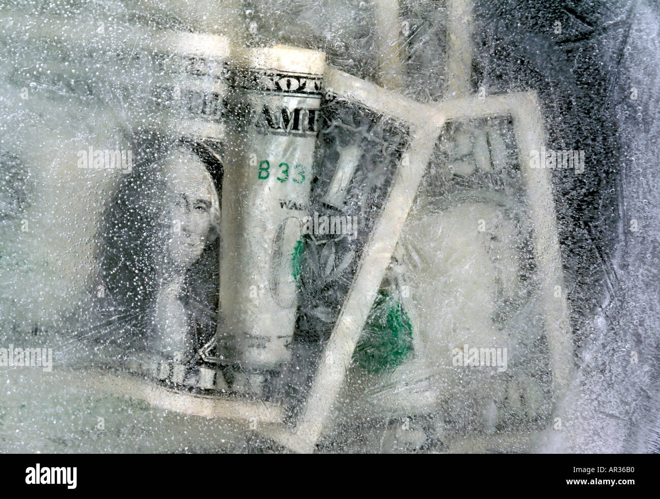 Money Frozen dollars h Stock Photo - Alamy