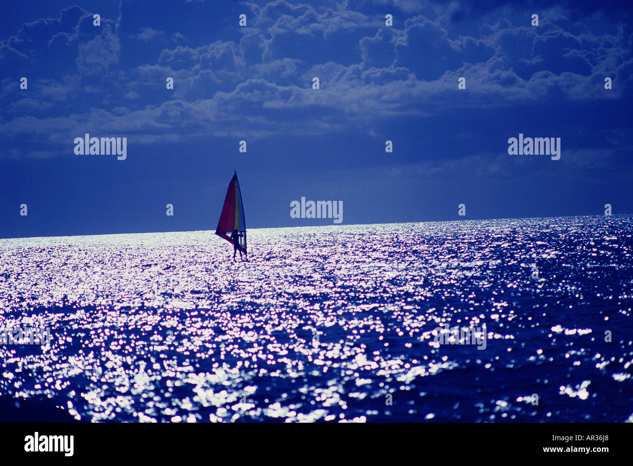 Windsurfing sailboarding windsurfer sailboarder sailing Stock Photo - Alamy