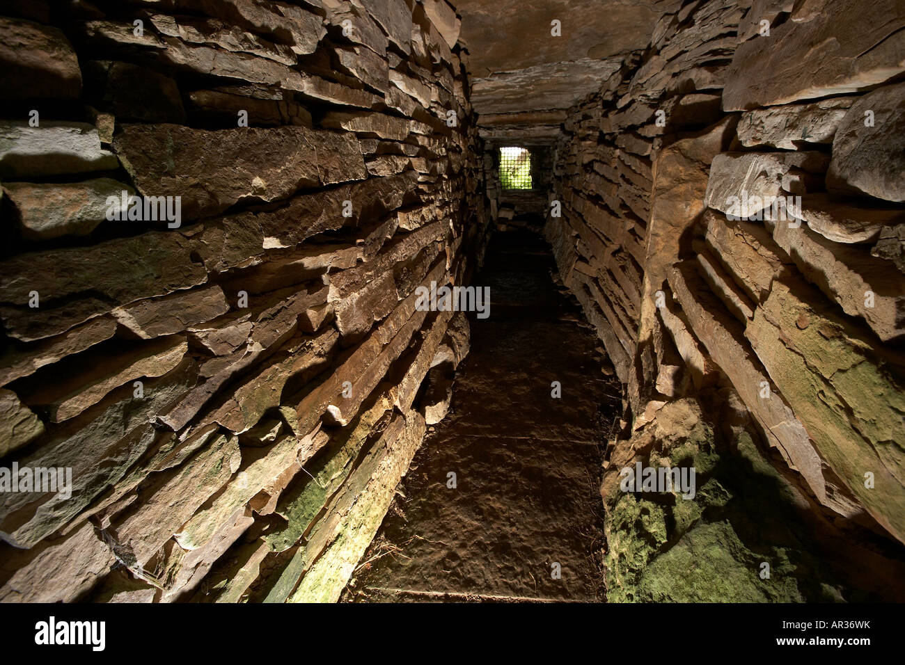 The connecting chamber at the Taversoe Tuick Neolithic Chambered cairn ...
