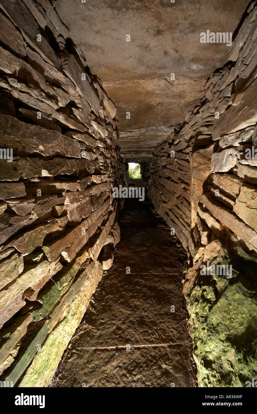 The connecting chamber at the Taversoe Tuick Neolithic Chambered cairn ...
