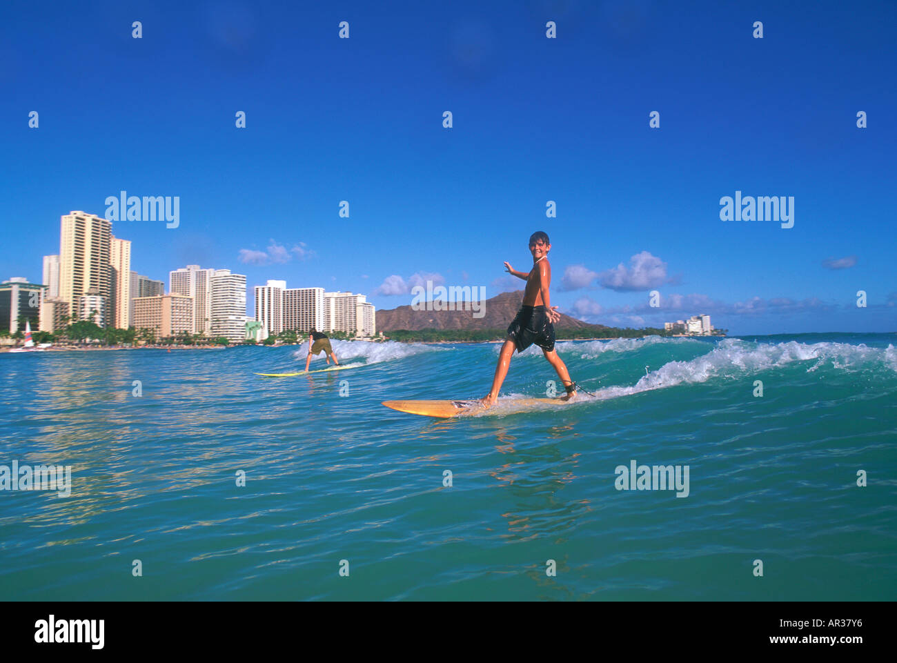 Waikiki surfing hi-res stock photography and images - Alamy