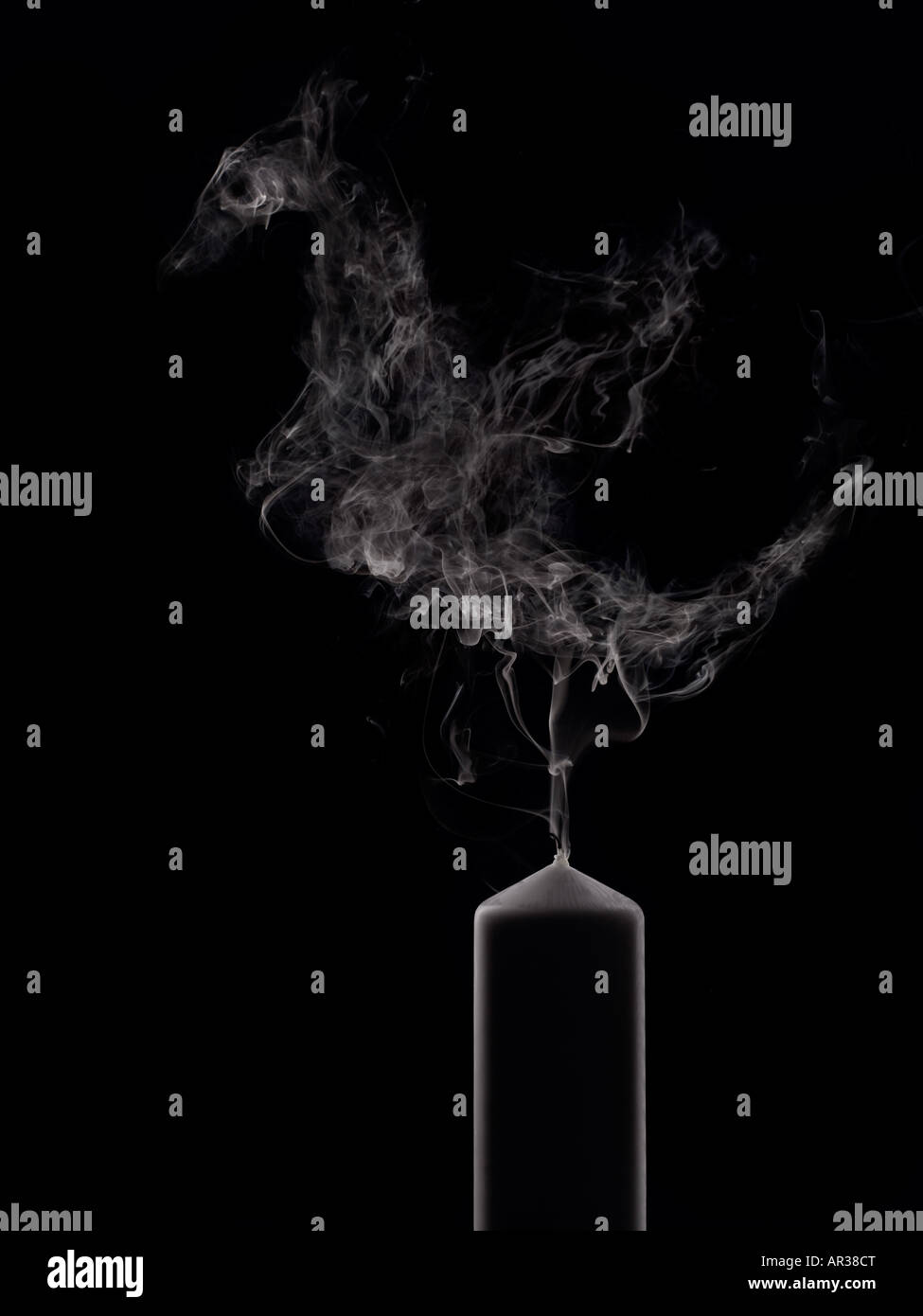 Dragon appearing in candle smoke Stock Photo - Alamy