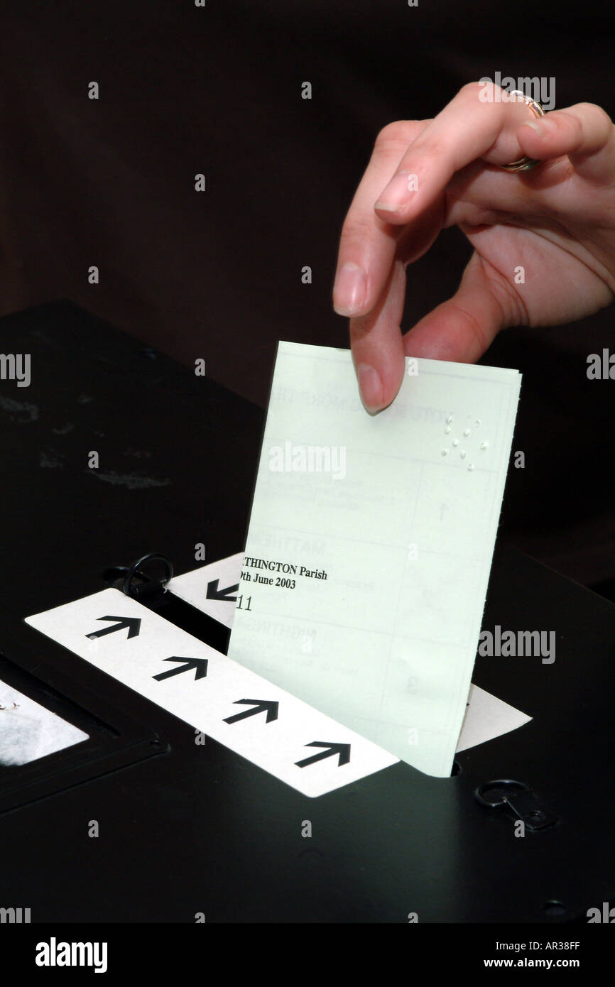 Ballot Box Voting Paper Being Placed into Slot during election. Votes ...