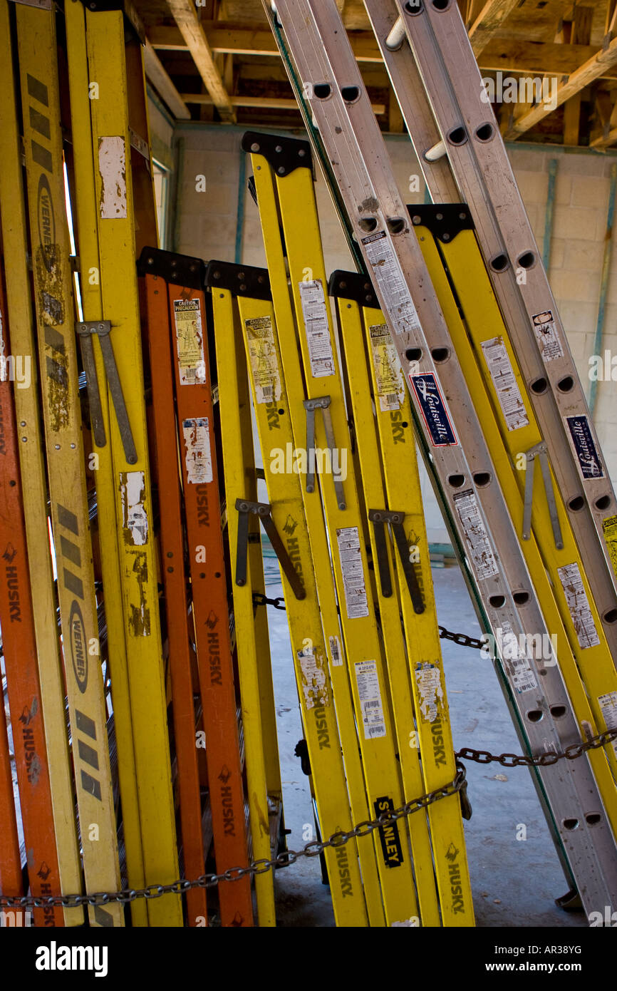 Several Ladders Secured by a Chain Stock Photo - Alamy