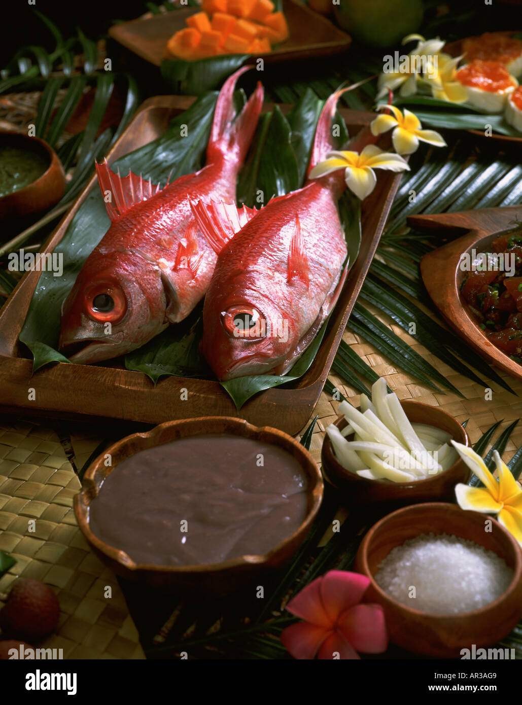 Fish and poi for Hawaiian luau Stock Photo - Alamy