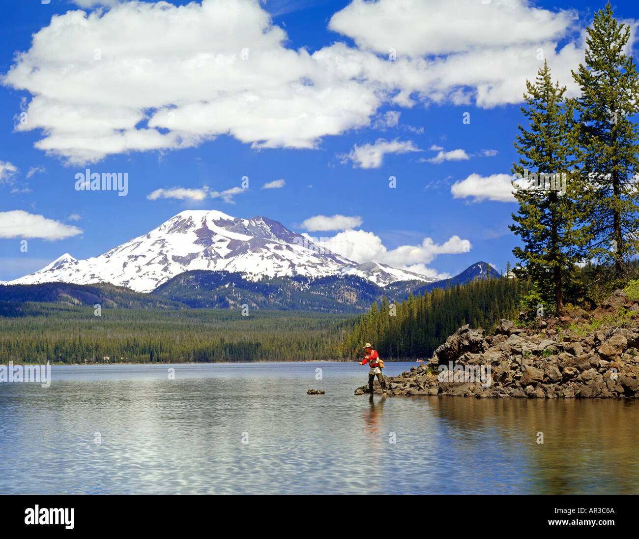 man fishing Green Lakes at South Sister mountain in Central Oregon ...
