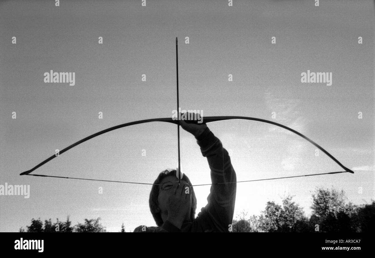 boy with a bow Stock Photo - Alamy