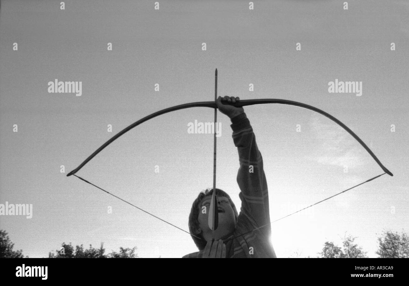 boy with a bow Stock Photo - Alamy
