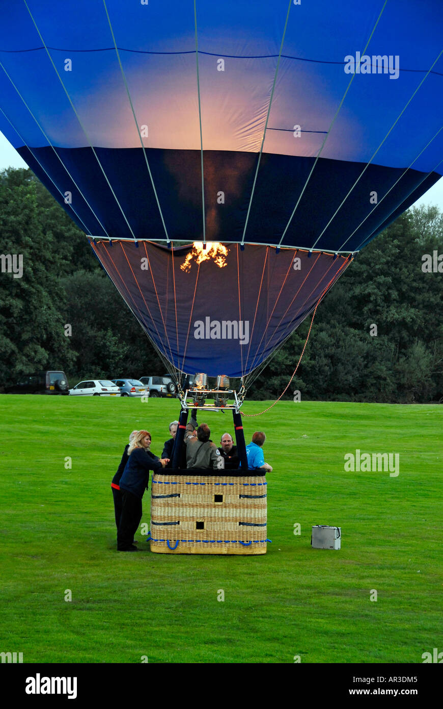 Hot air balloon lifting off Stock Photo - Alamy