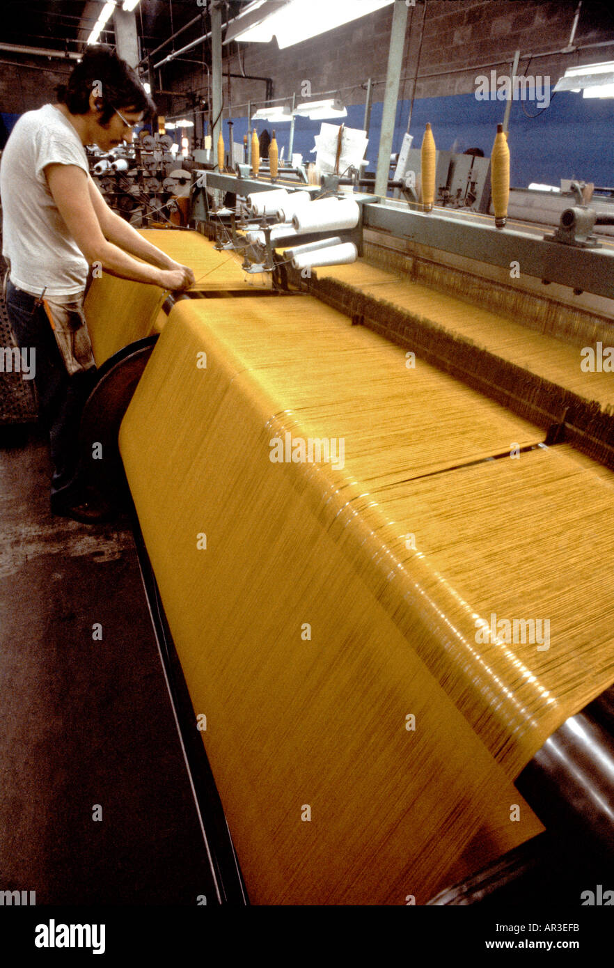 Textiles worker hi-res stock photography and images - Alamy