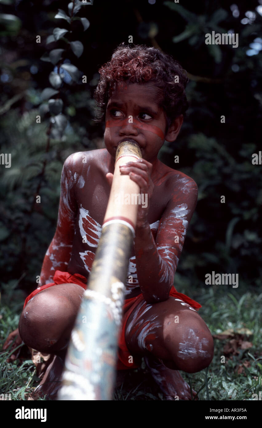 Australian aboriginal boy playing didgeridoo Stock Photo - Alamy
