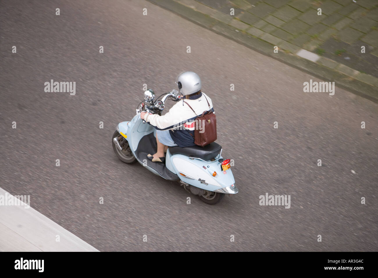 Woman skirt bike hi-res stock photography and images - Alamy