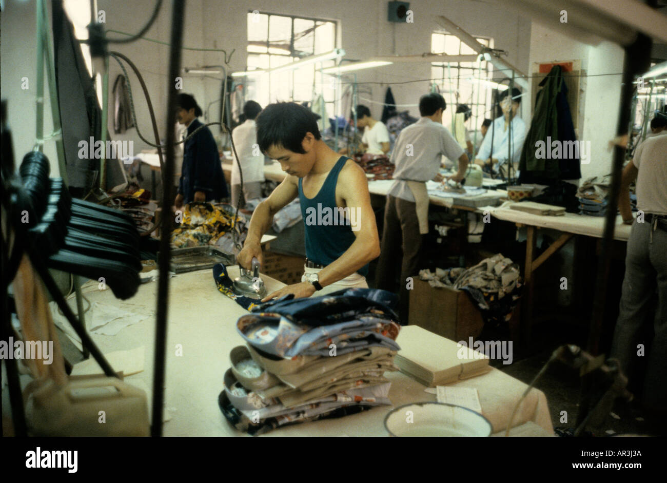 Chinese workers in a shirt factory Stock Photo - Alamy