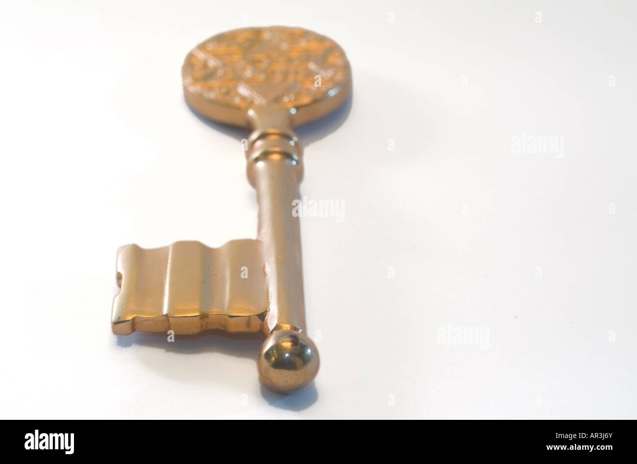 A Ceremonial key Old style gold key on a white back ground Stock Photo ...
