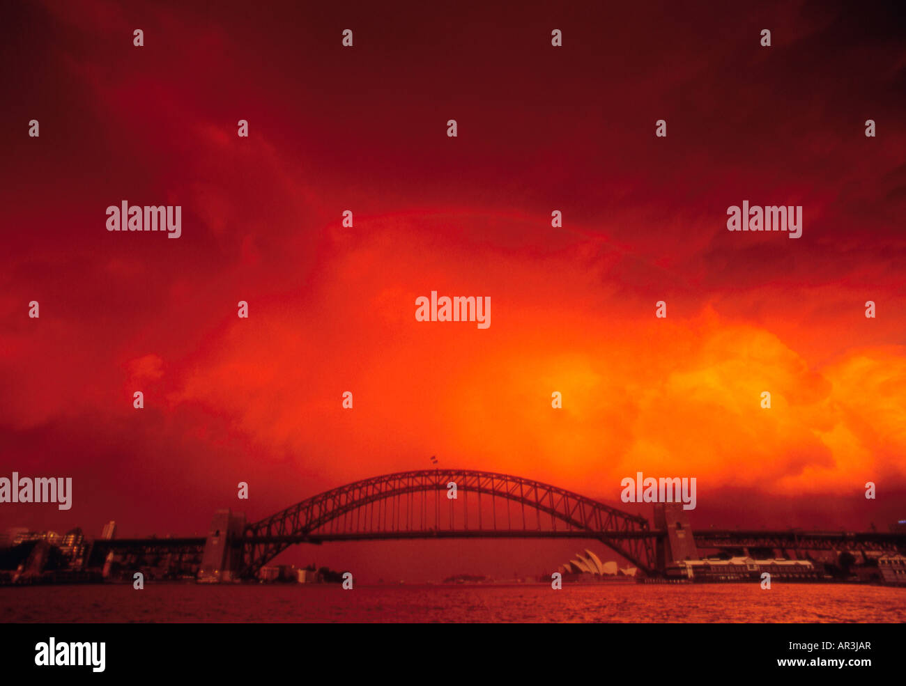 storm over Sydney Harbour, dramatically lit at sunset, from McMahon’s ...