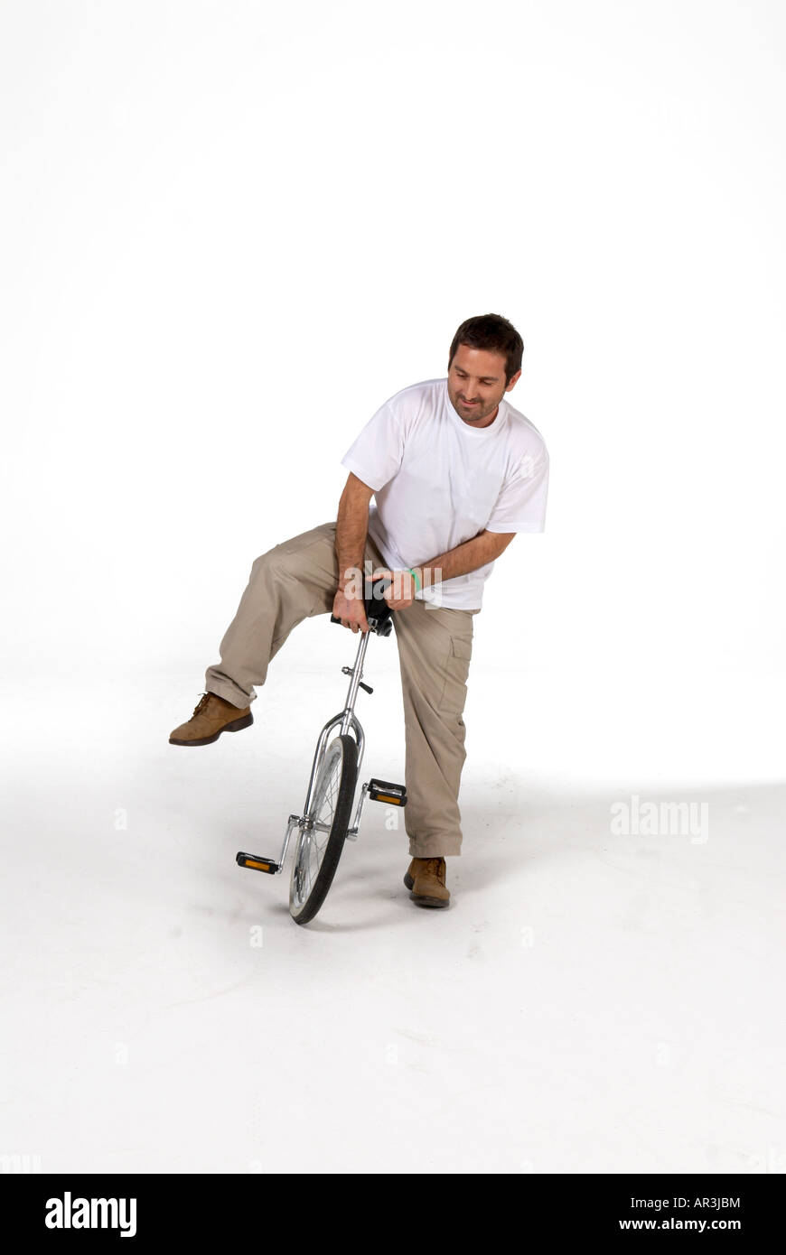 Rides a unicycle hi-res stock photography and images - Alamy