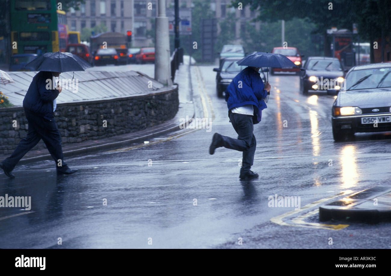 Man running across a street hi-res stock photography and images - Alamy