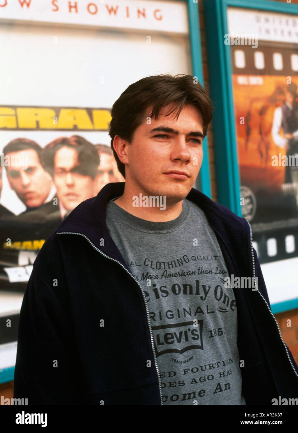 Man Standing Outside Cinema Waiting Stock Photo - Alamy