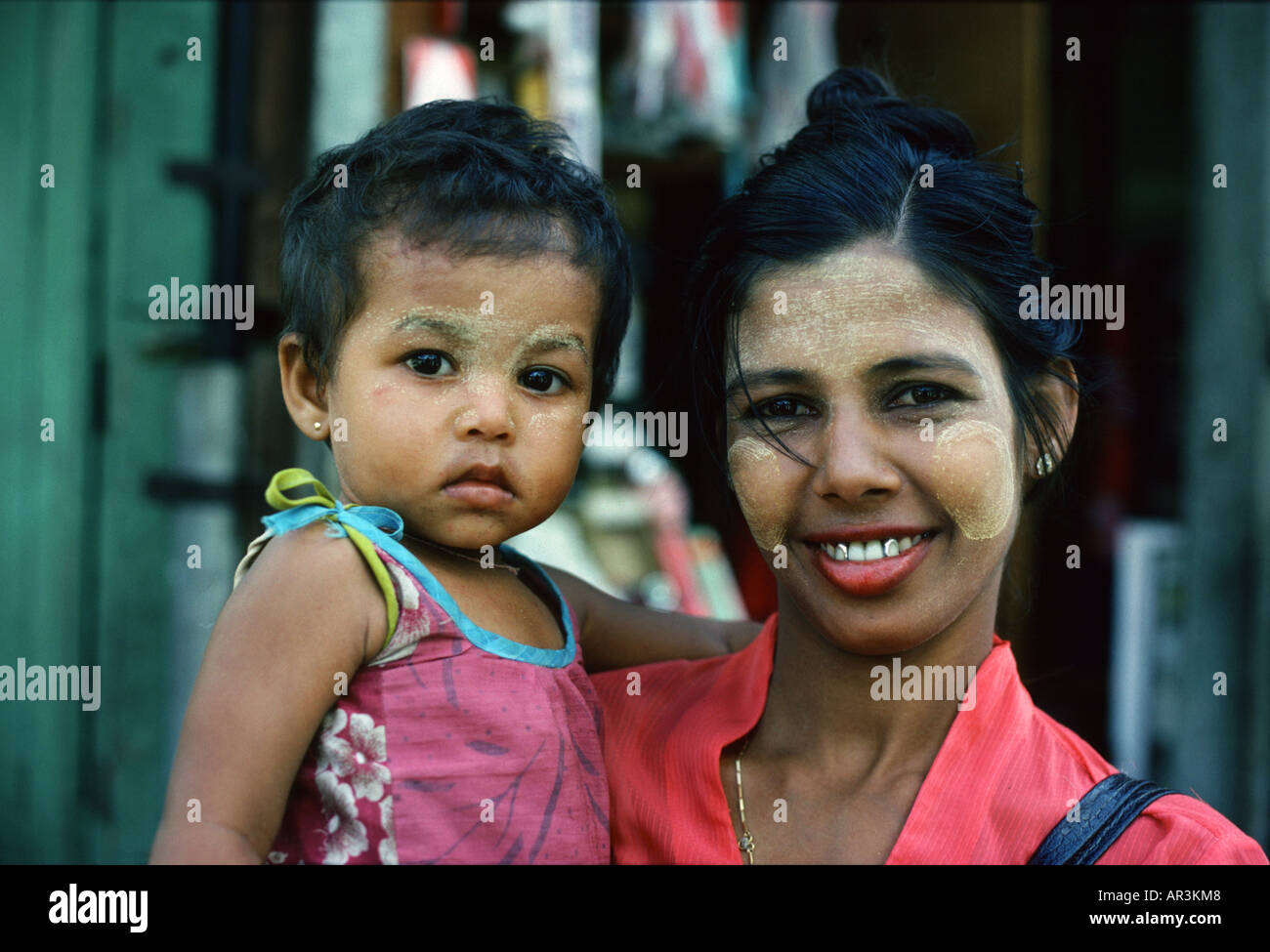 Mother and girl with Thanaka paste, Rangoon, Myanmar, Asia Stock Photo ...