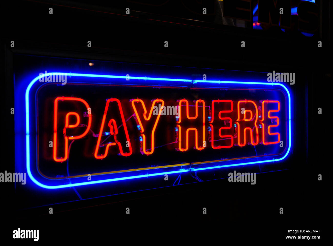 pay here neon sign Stock Photo - Alamy