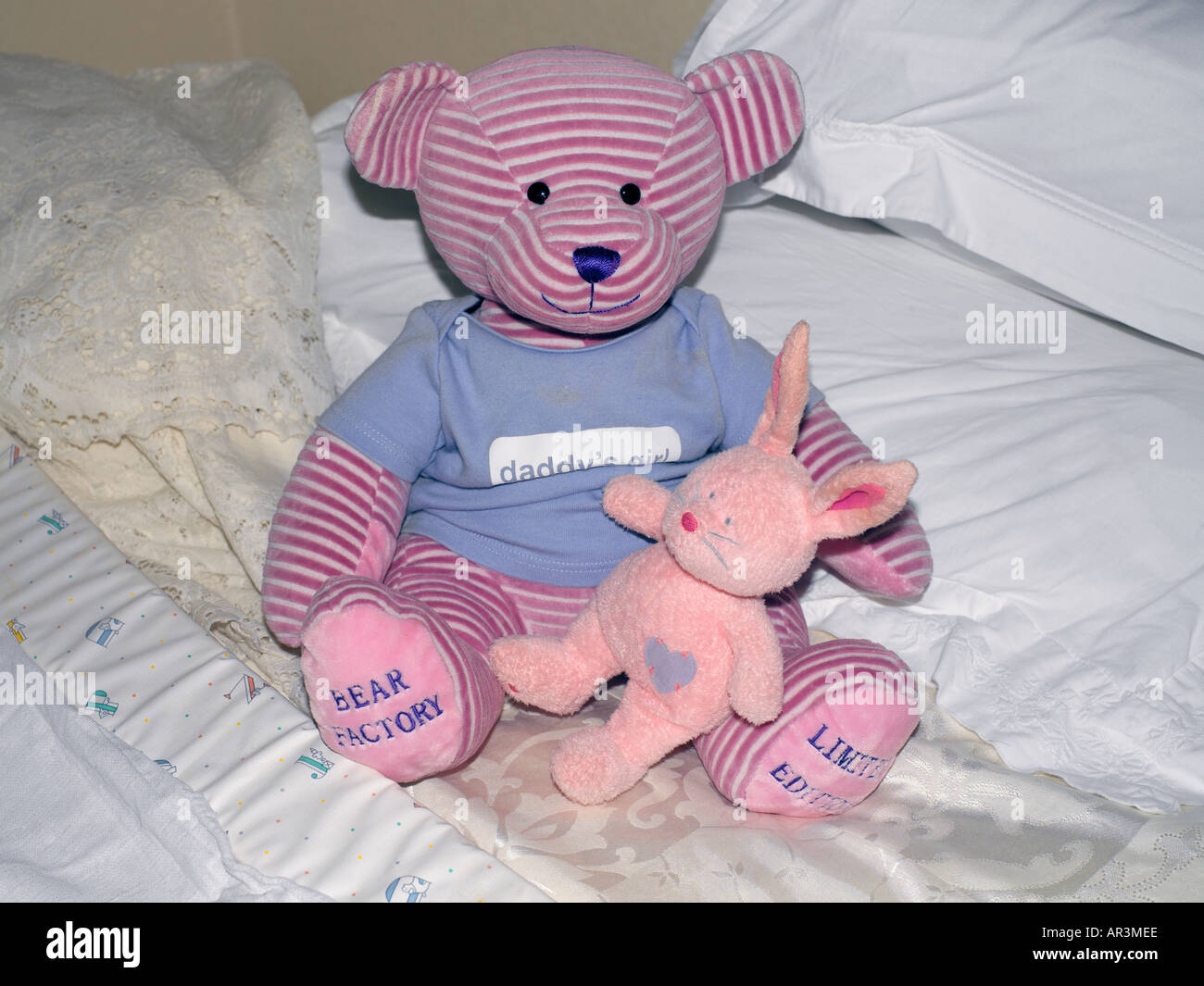 Pink Stripey Teddy Bear with Rabbit Stock Photo - Alamy