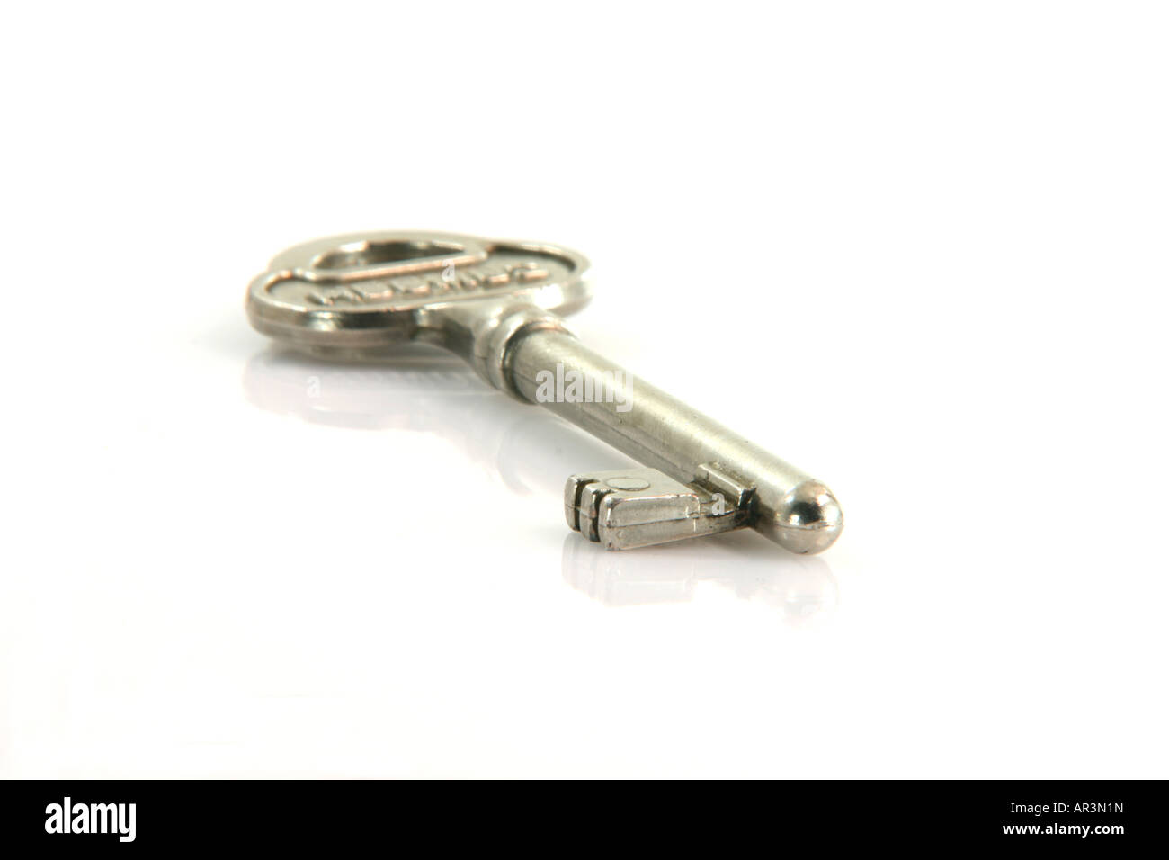 retro key isolated on white backround with reflection Stock Photo - Alamy