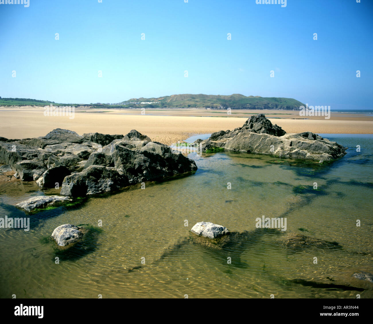 rock pool broughton bay llanmadoc gower peninsula south wales Stock ...