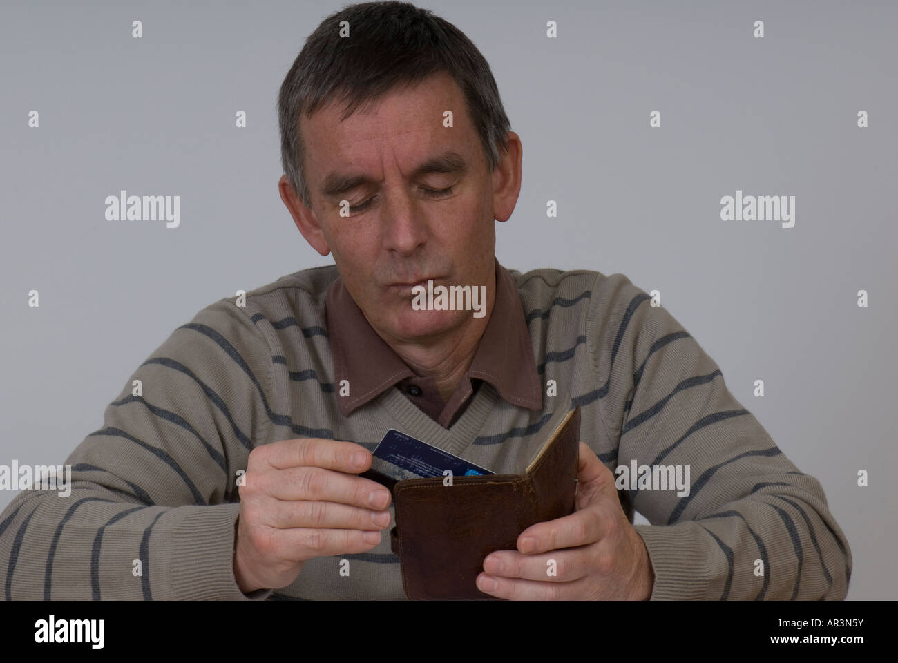 Man crying money hi-res stock photography and images - Alamy