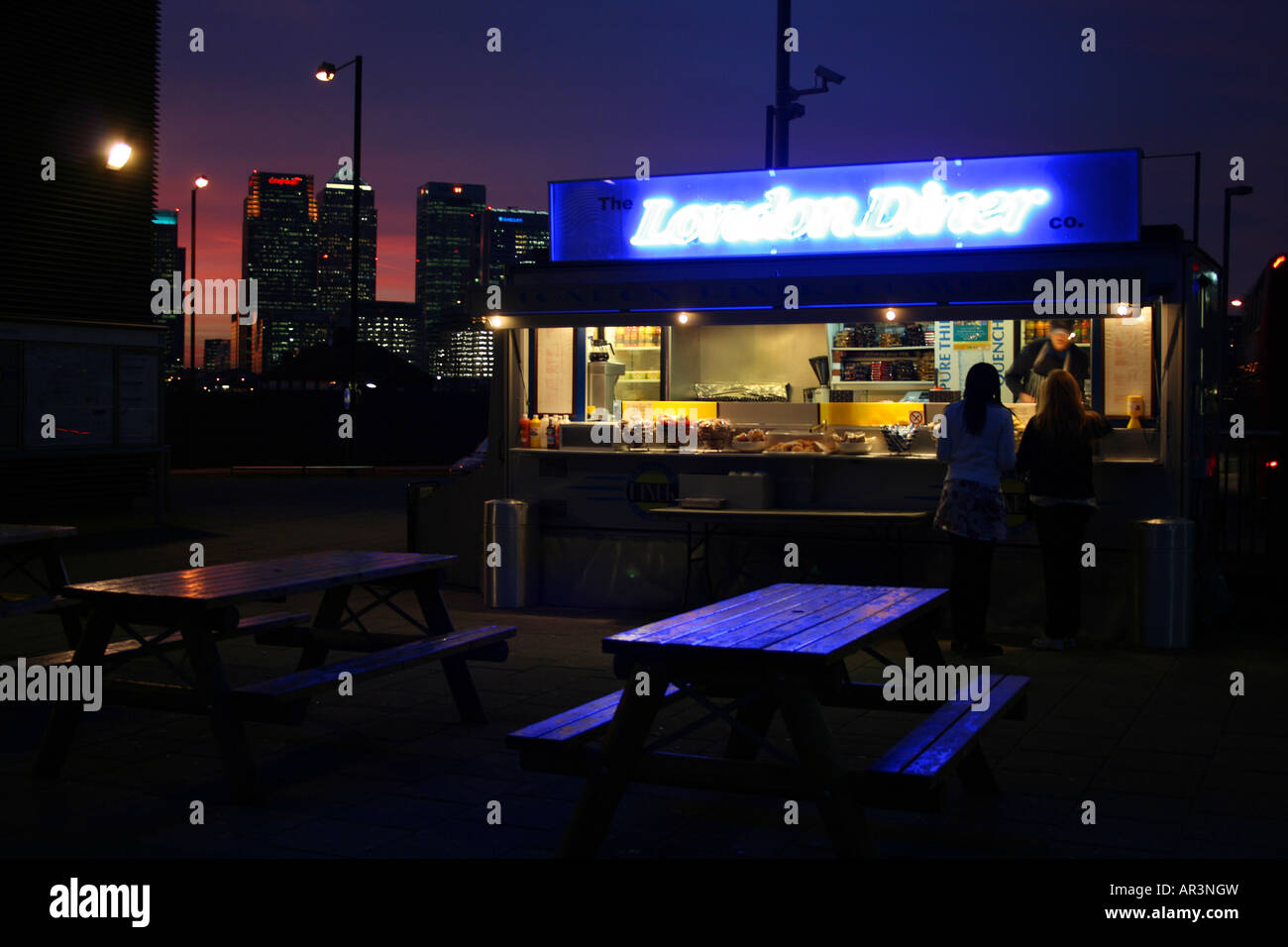 London diner serving outside hut at North Greenwich station, London ...
