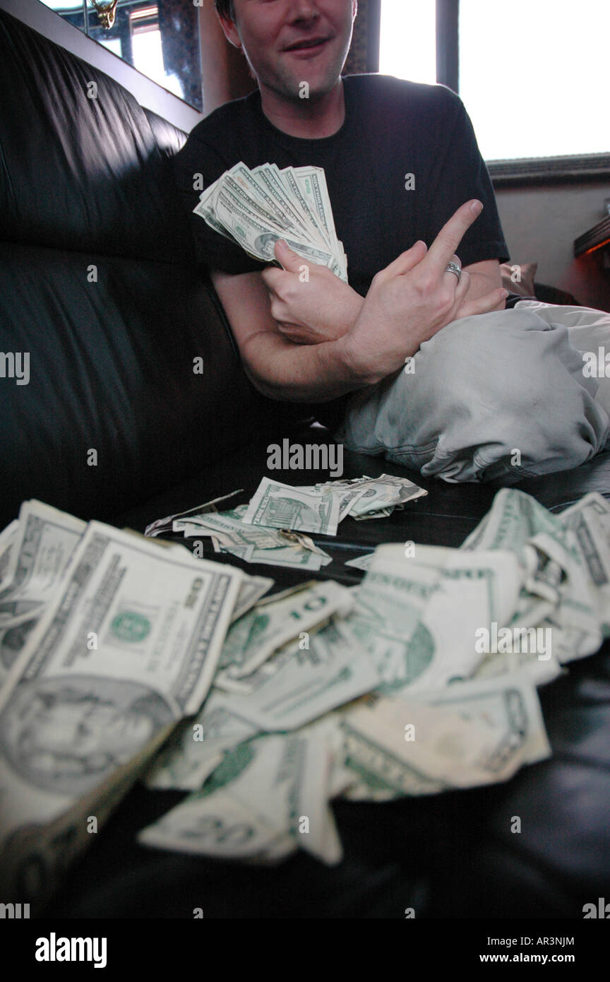 Money dollars piles hi-res stock photography and images - Alamy