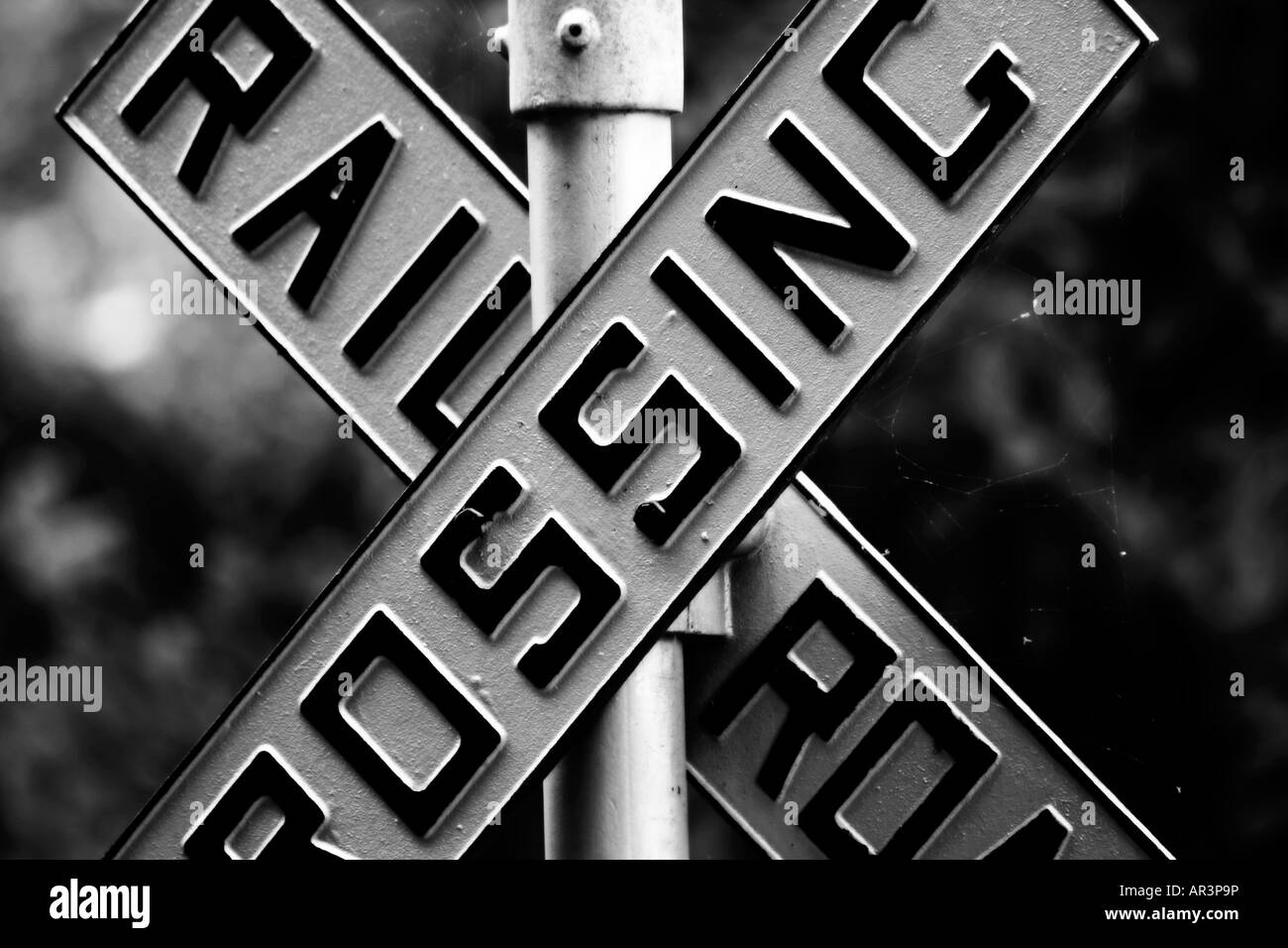 Railroad crossing sign black & white Stock Photo - Alamy