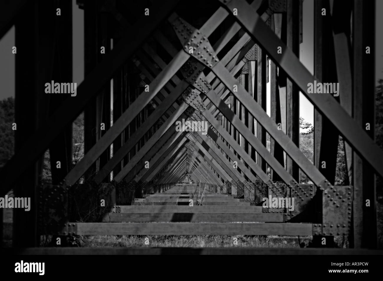 Underneath structure of a rail bridge black and white Stock Photo - Alamy