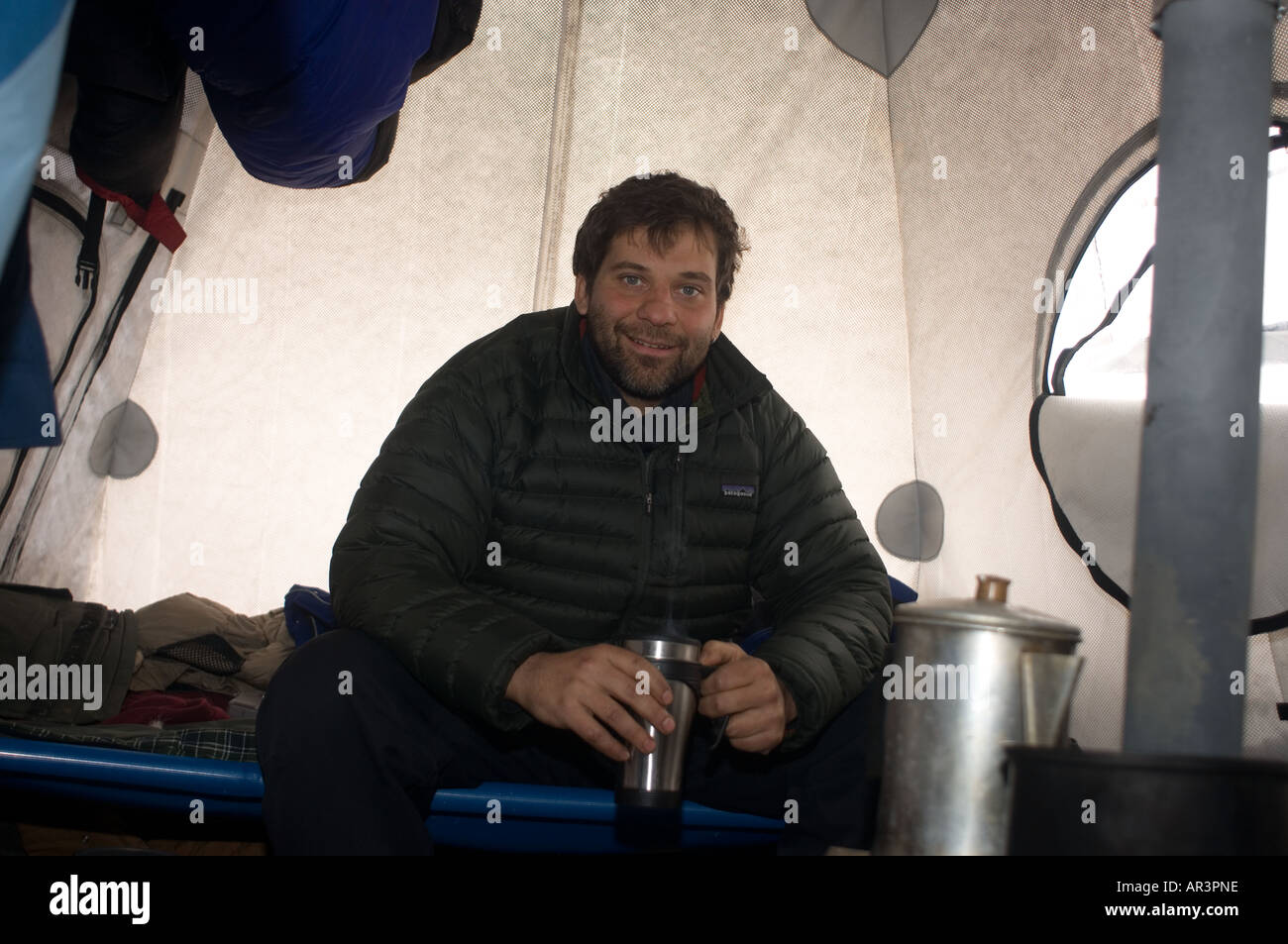 photographer Steven Kazlowski having morning coffee in the tent camp ...