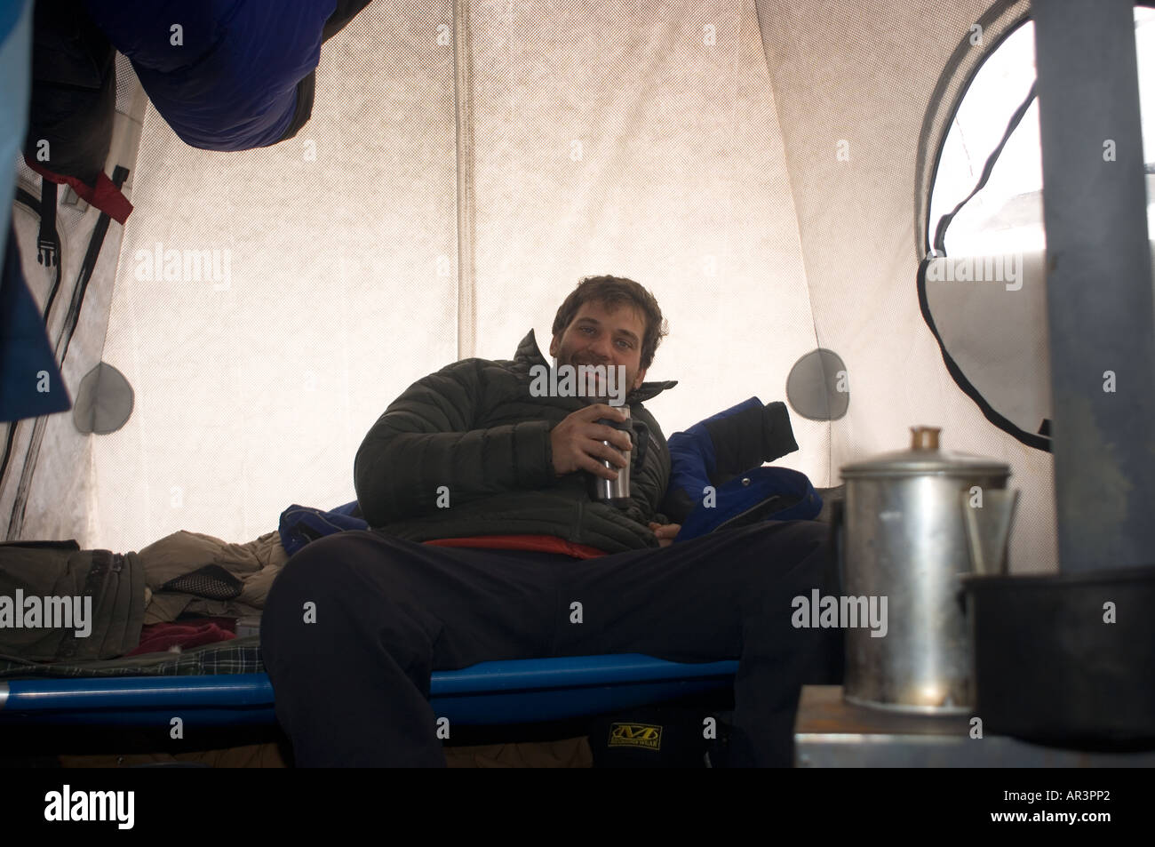 photographer Steven Kazlowski having morning coffee in the tent camp ...
