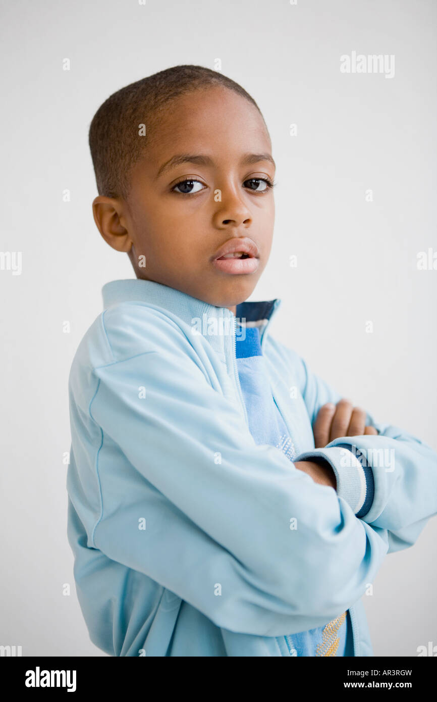 African boy with arms crossed Stock Photo - Alamy